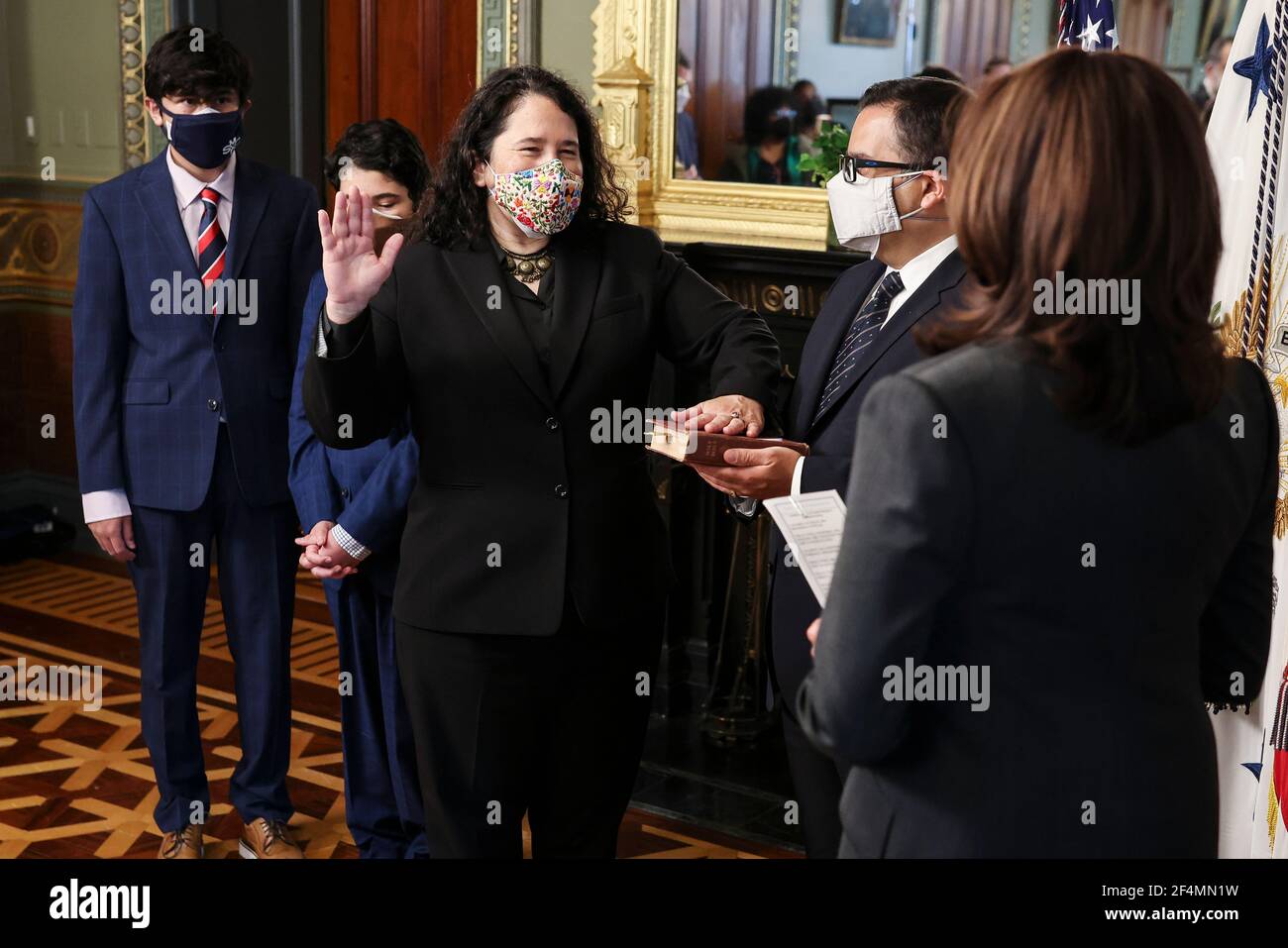 Washington, USA. 22nd Mar, 2021. Vice President Kamala Harris, right ...