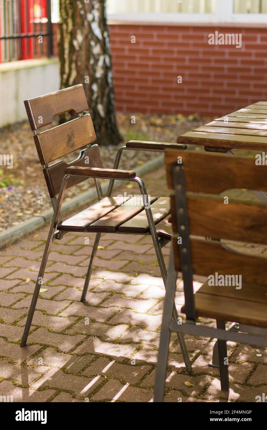 POZNAN, POLAND - Aug 25, 2017: Wooden chair with Tymbark logo and table ...