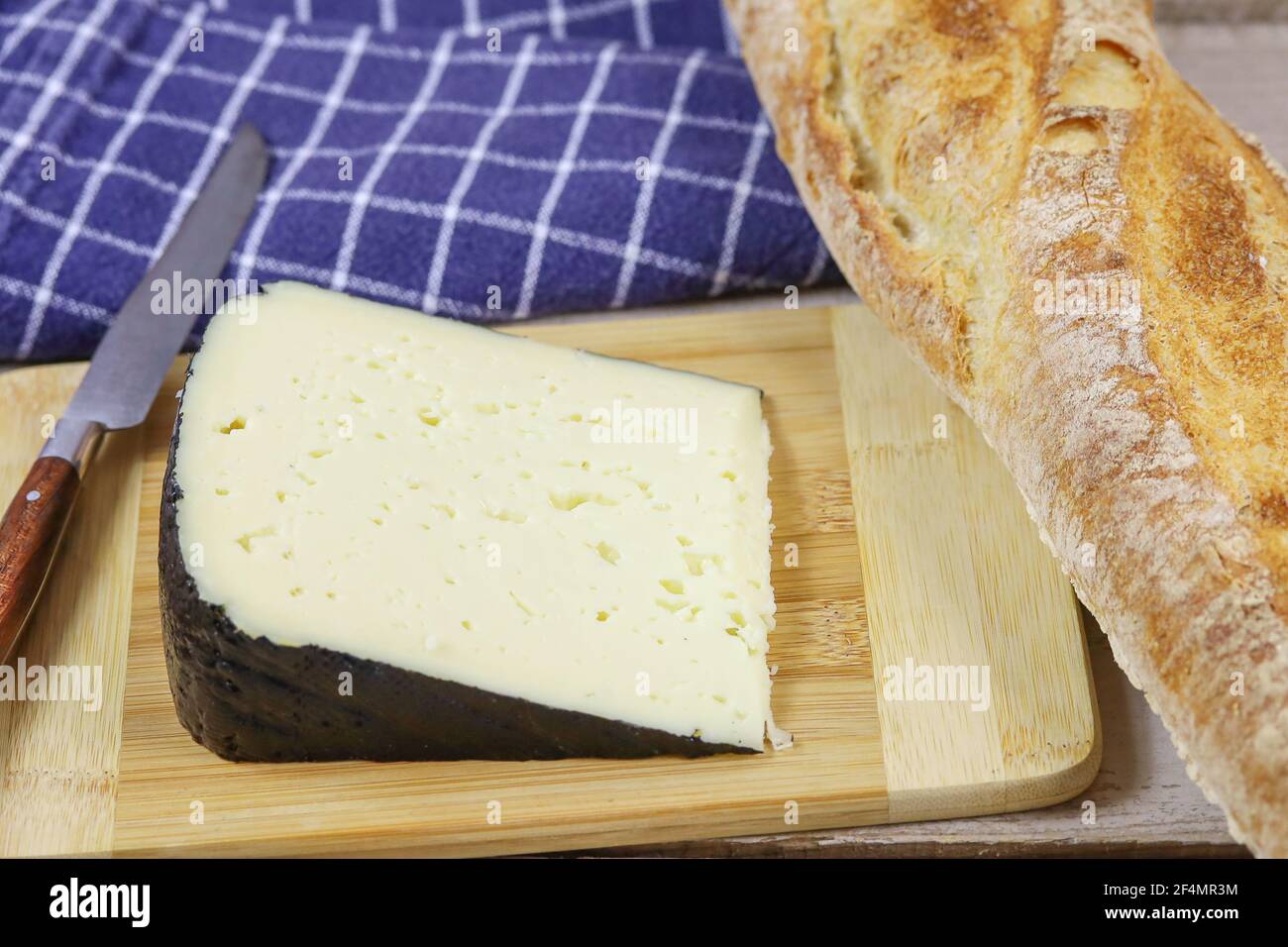black tomme cheese from the pyrenees Stock Photo - Alamy