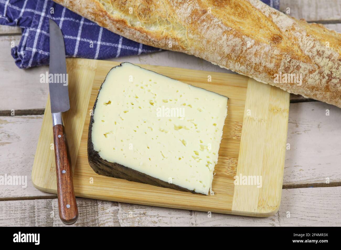 black tomme cheese from the pyrenees Stock Photo - Alamy