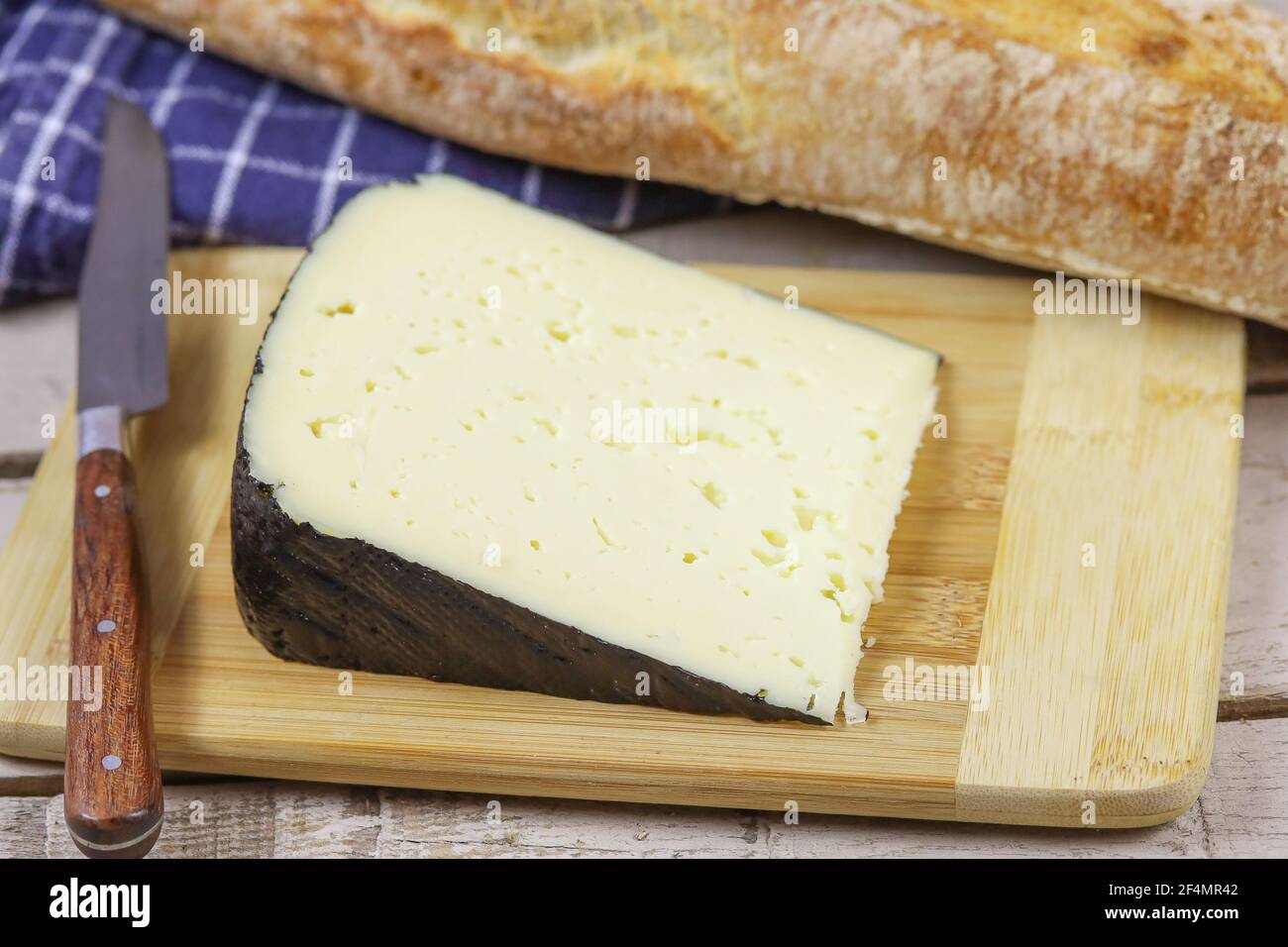 black tomme cheese from the pyrenees Stock Photo - Alamy