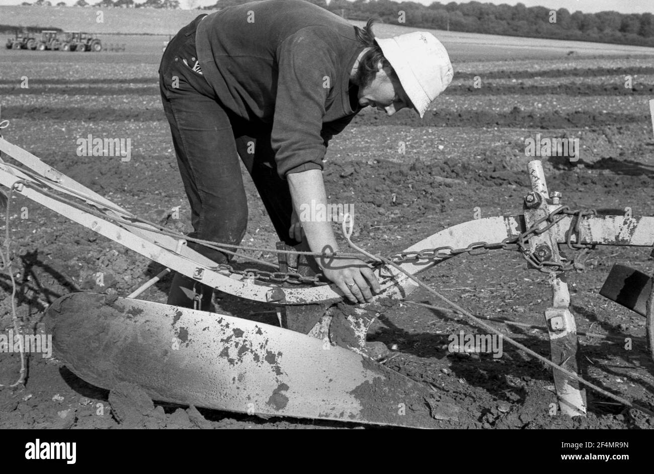 East Kent Ladies Ploughing Competition with Horses. Woman repairing ...