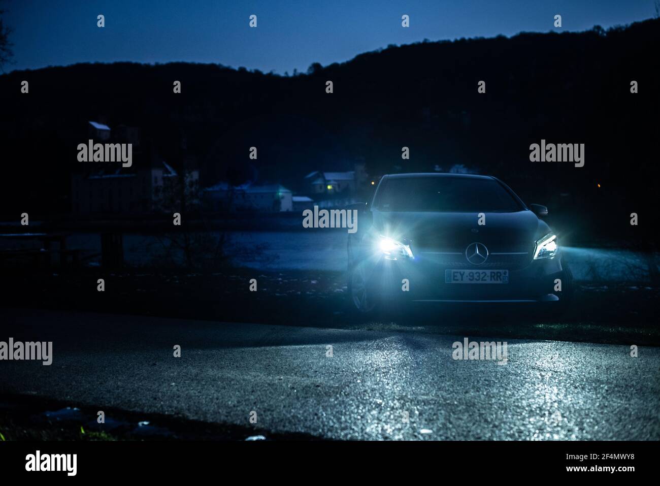 Dramatic night view of luxury Mercedes Benz car. Front view of premium ...