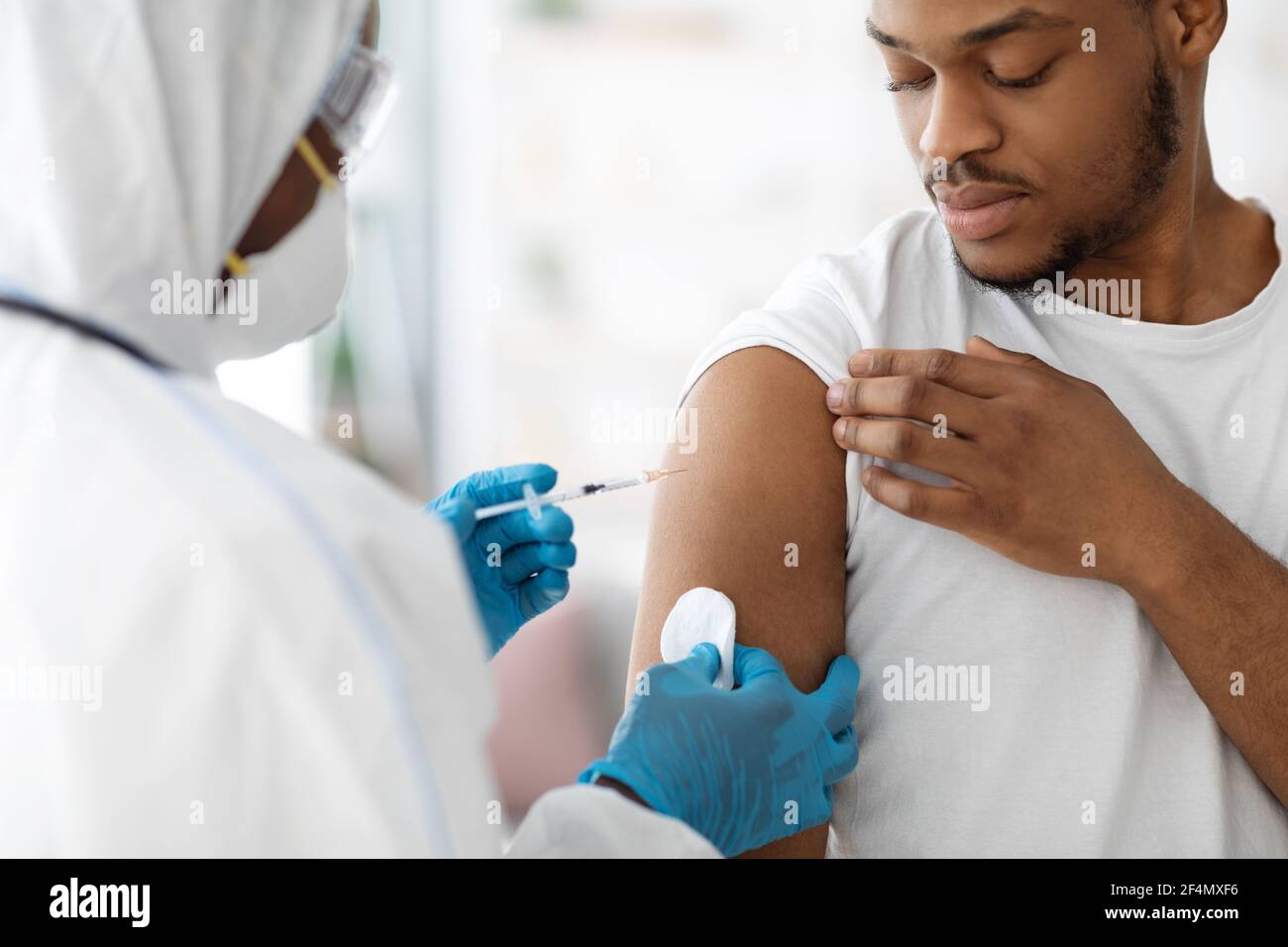Doc in protective suit hi-res stock photography and images - Alamy