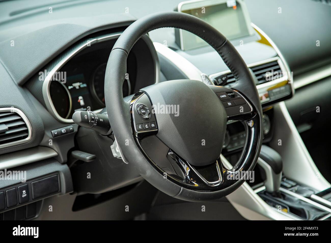 empty interior of modern premium car dark interior close-up steering ...