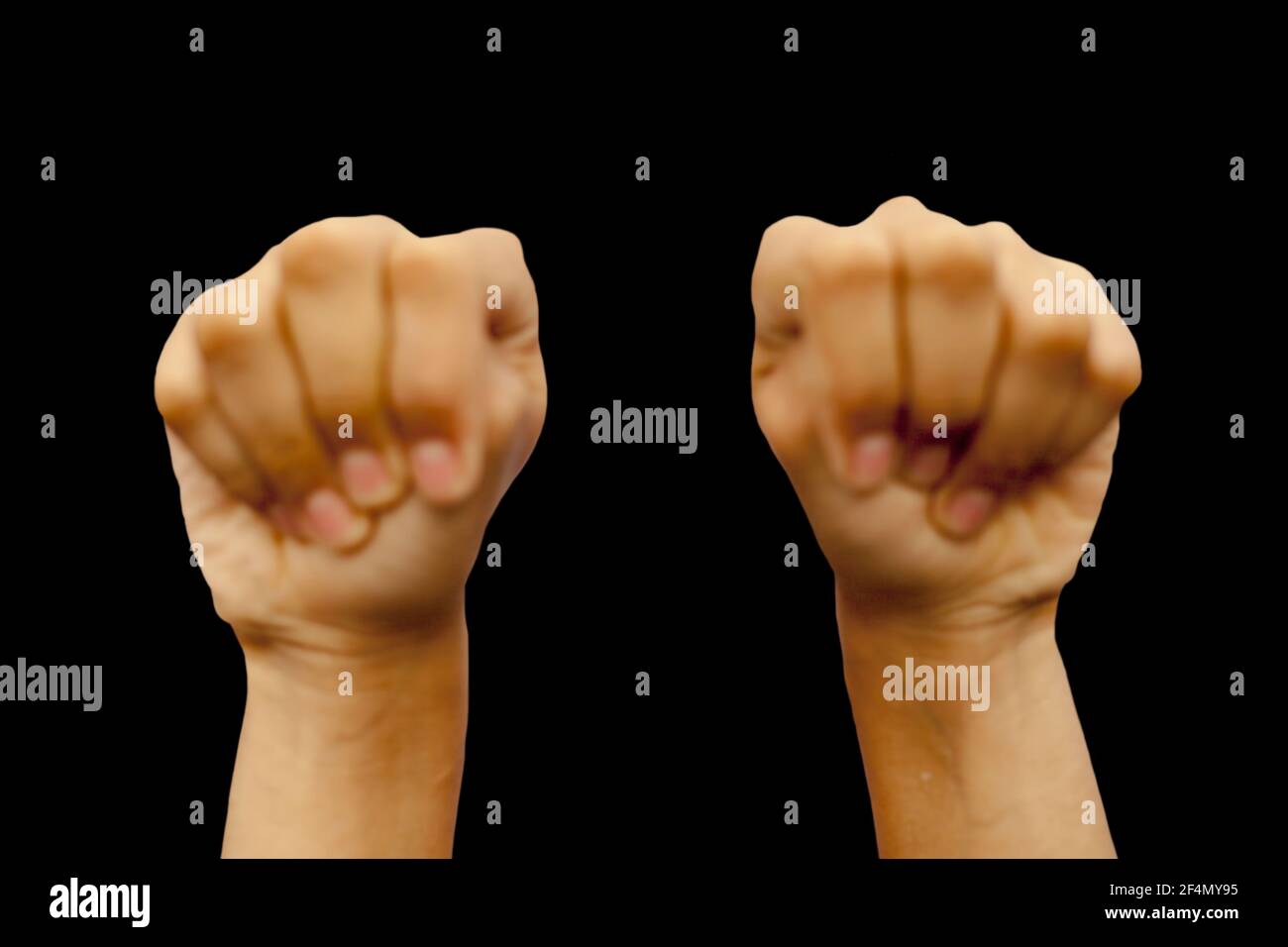 Mushti Mudra demonstrated by male hands isolated on black background ...