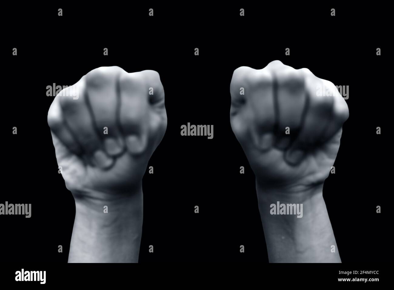 Mushti Mudra demonstrated by male hands isolated on black background ...