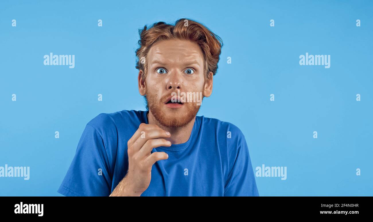 Shocked young bearded man hi-res stock photography and images - Alamy