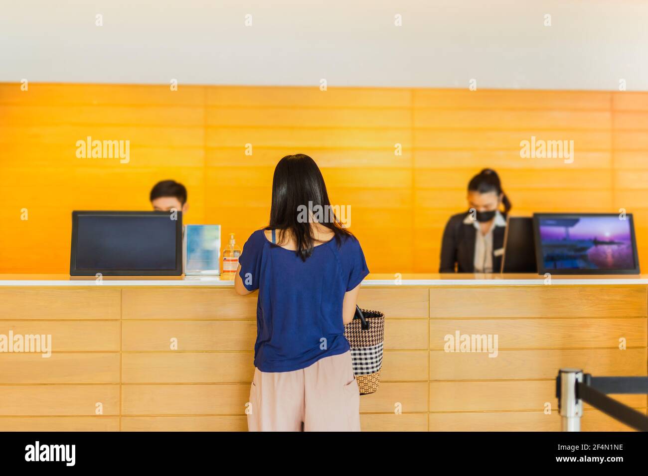 Happy business woman in hotel at desk hi-res stock photography and ...