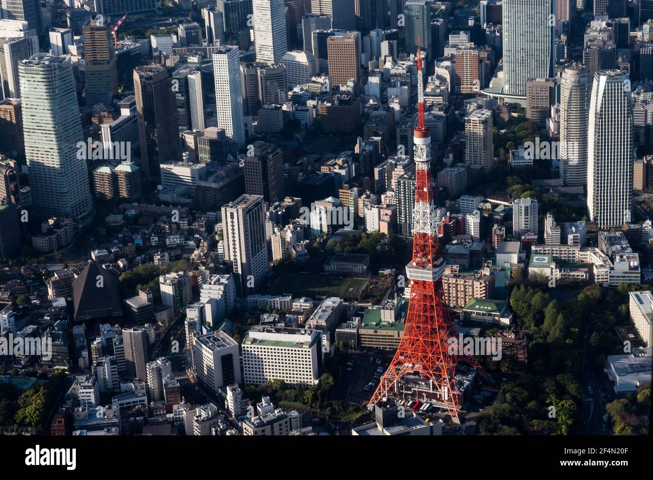 A horizontal aerial view of Tokyo Tower from a helicopter on a sunny ...