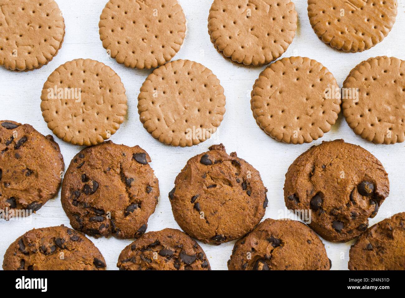 Different types of round cookies on a white background Stock Photo - Alamy