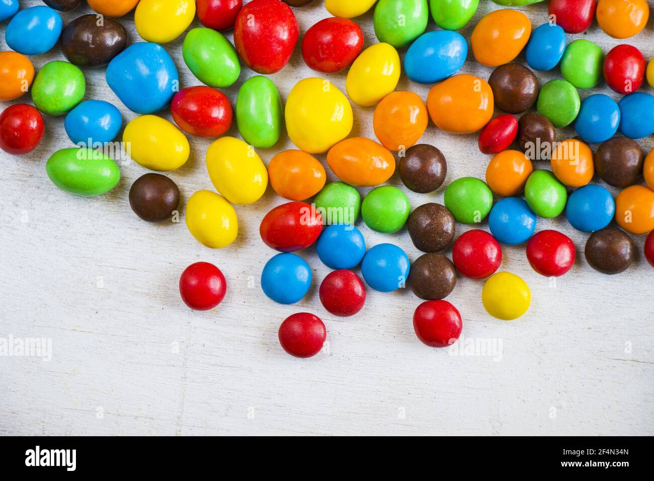 Chocolate candy balls on the white background Stock Photo - Alamy