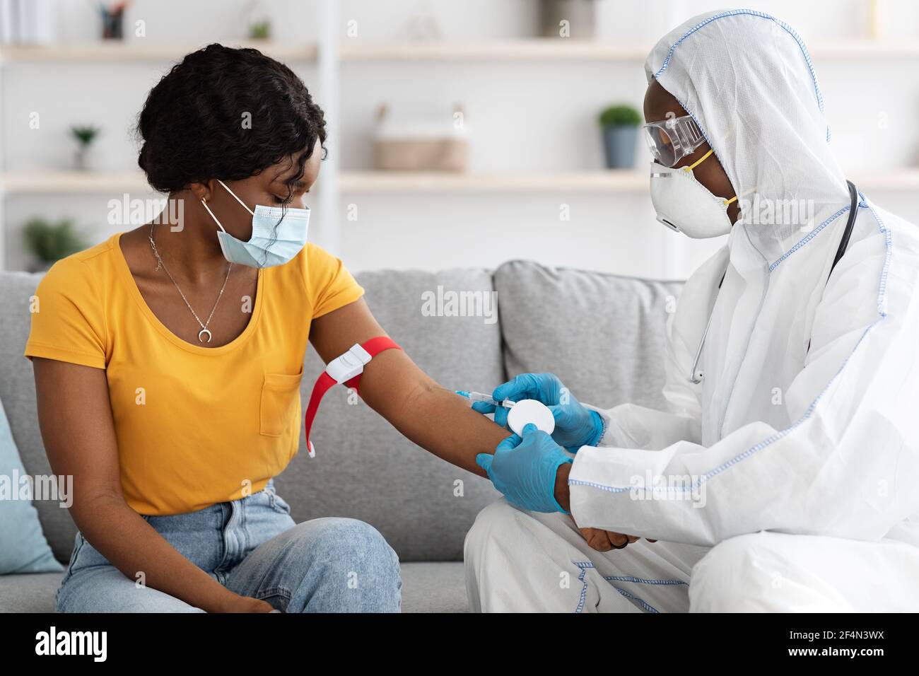 Female patient hospital blood sample hi-res stock photography and ...