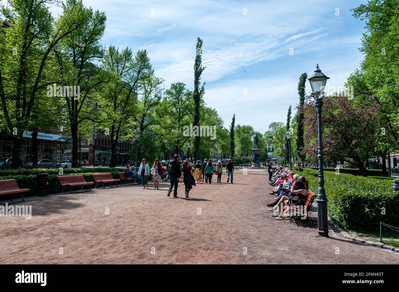 Visitors in Esplanade park in the middle of Pohjoisesplanadi, the main ...