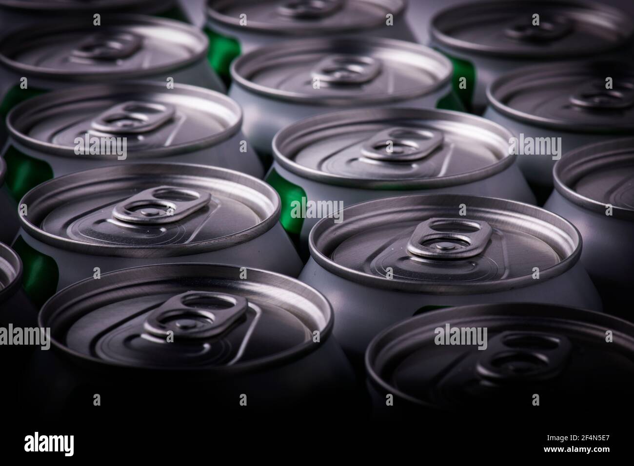 Close up aluminum drink can on a dark background, side view. Beer can ...