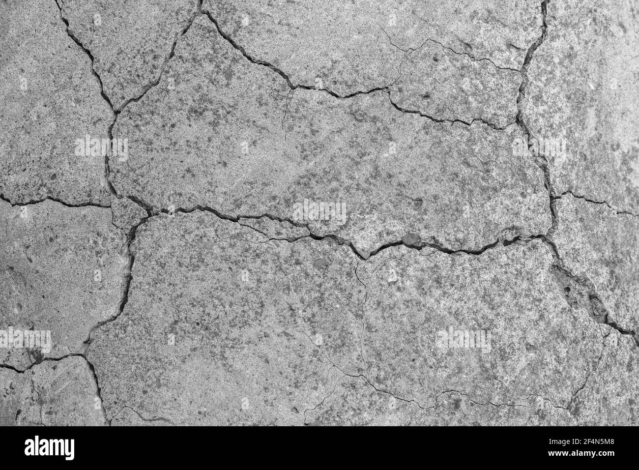 A high resolution old concrete cement with cracks and natural ...