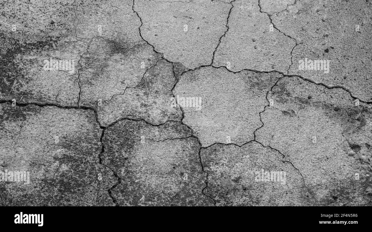 A high resolution old concrete cement with cracks and natural ...