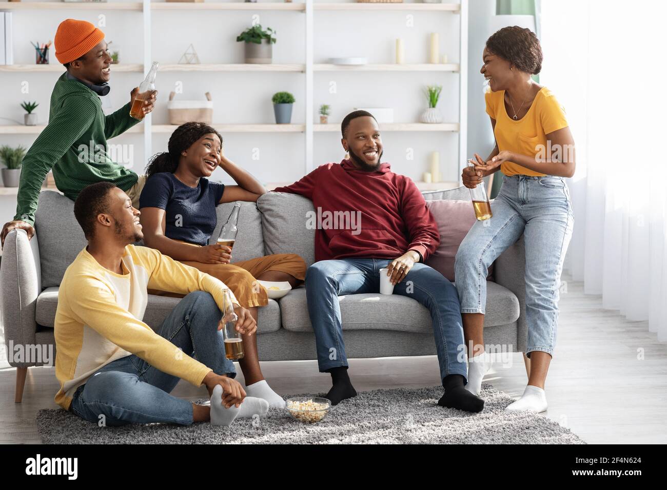 Group Of Black Friends Enjoying Drinks Party At Home Stock Photo - Alamy Group Of Black Friends Enjoying Drinks Party At Home Stock Photo - Alamy