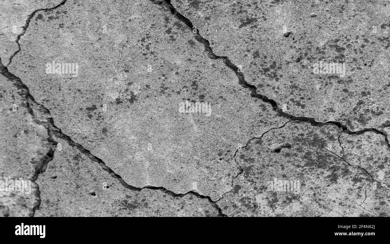 A high resolution old concrete cement with cracks and natural ...