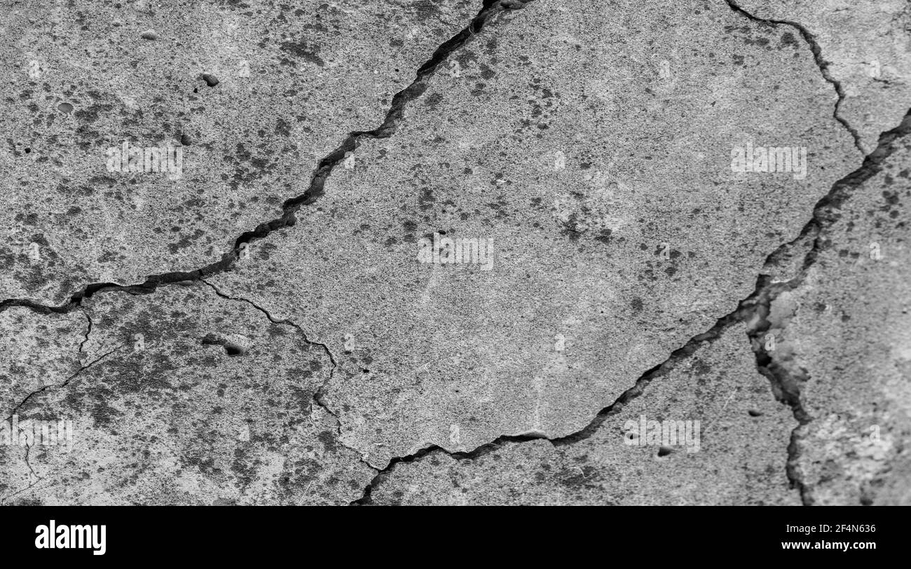 A high resolution old concrete cement with cracks and natural ...