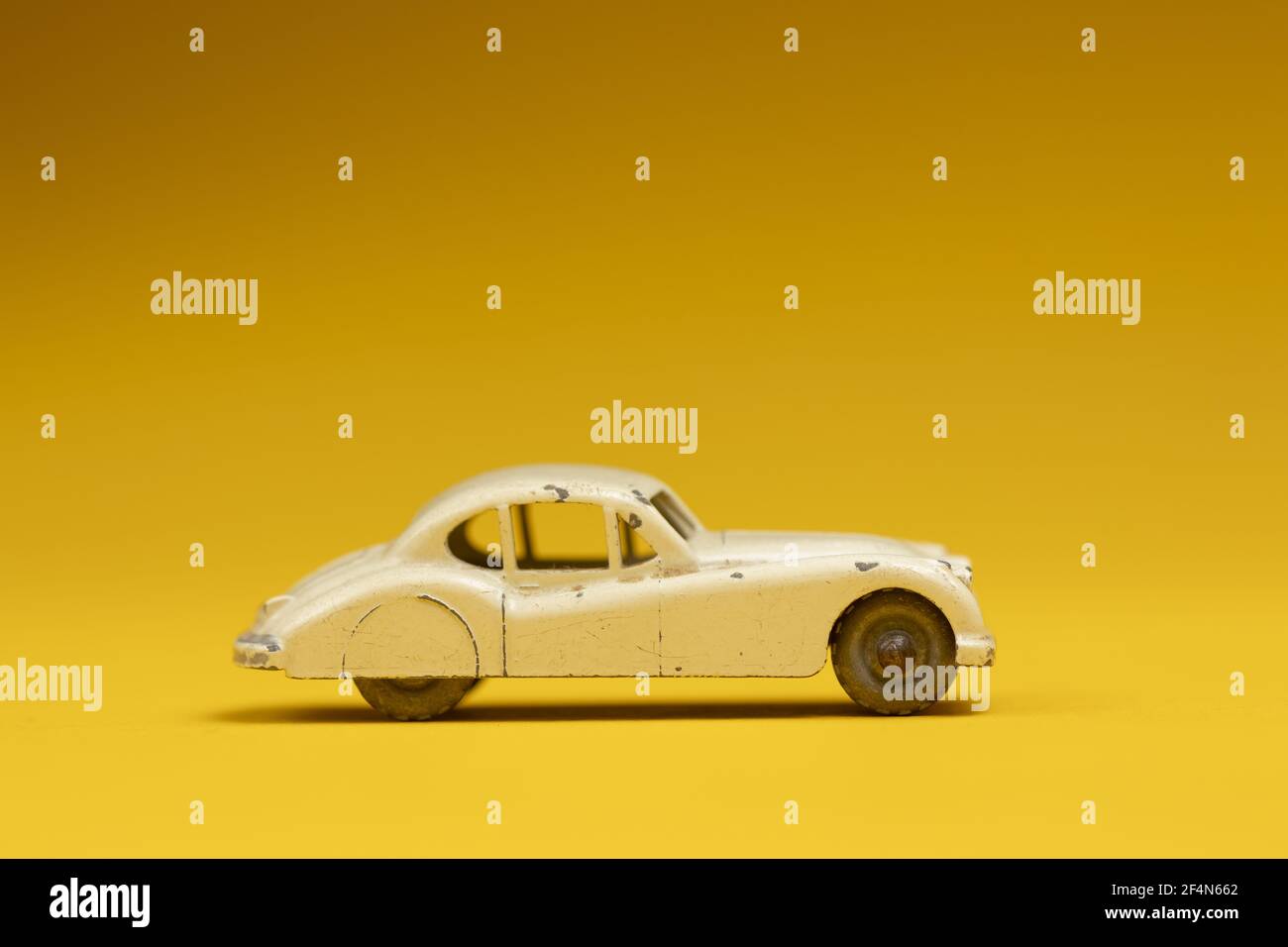 Studio toy still life against a seamless yellow background Stock Photo ...