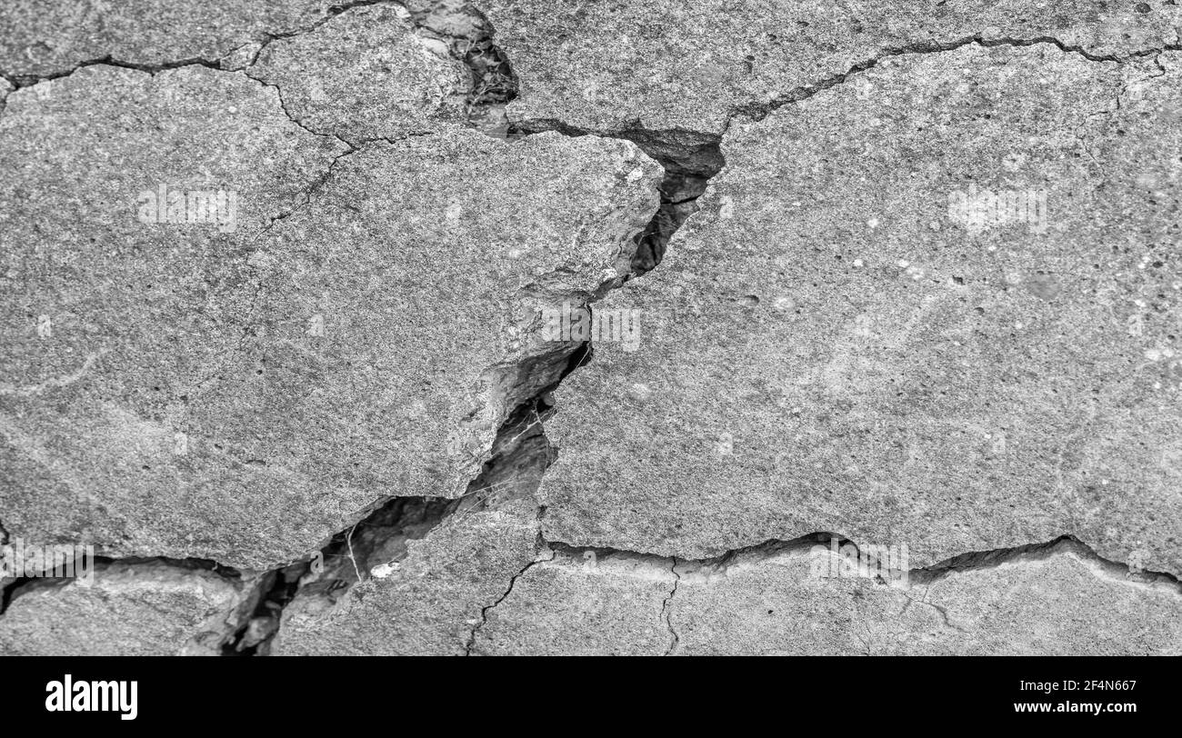A high resolution old concrete cement with cracks and natural ...