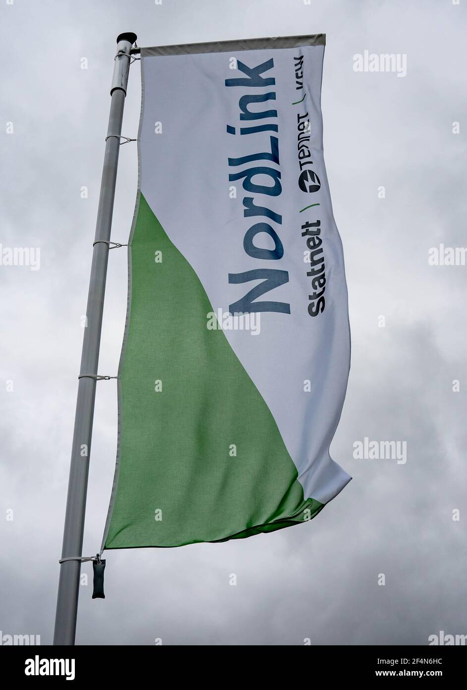Wilster, Germany. 22nd Mar, 2021. A flag of the Nordlink company flies ...