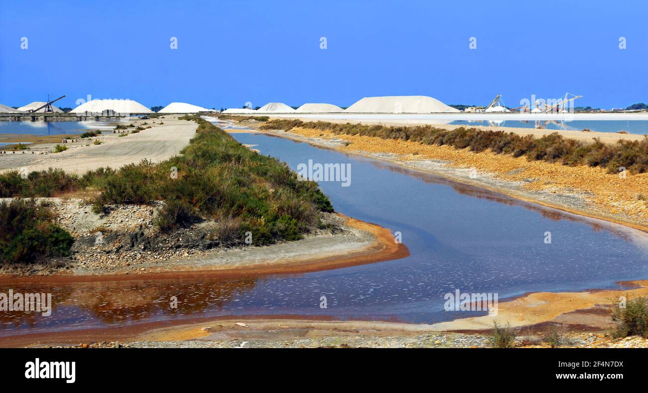 Salt marsh and salt pile harvested Stock Photo - Alamy