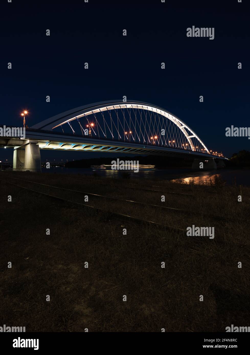 Apollo bridge on Danube river by night Stock Photo - Alamy