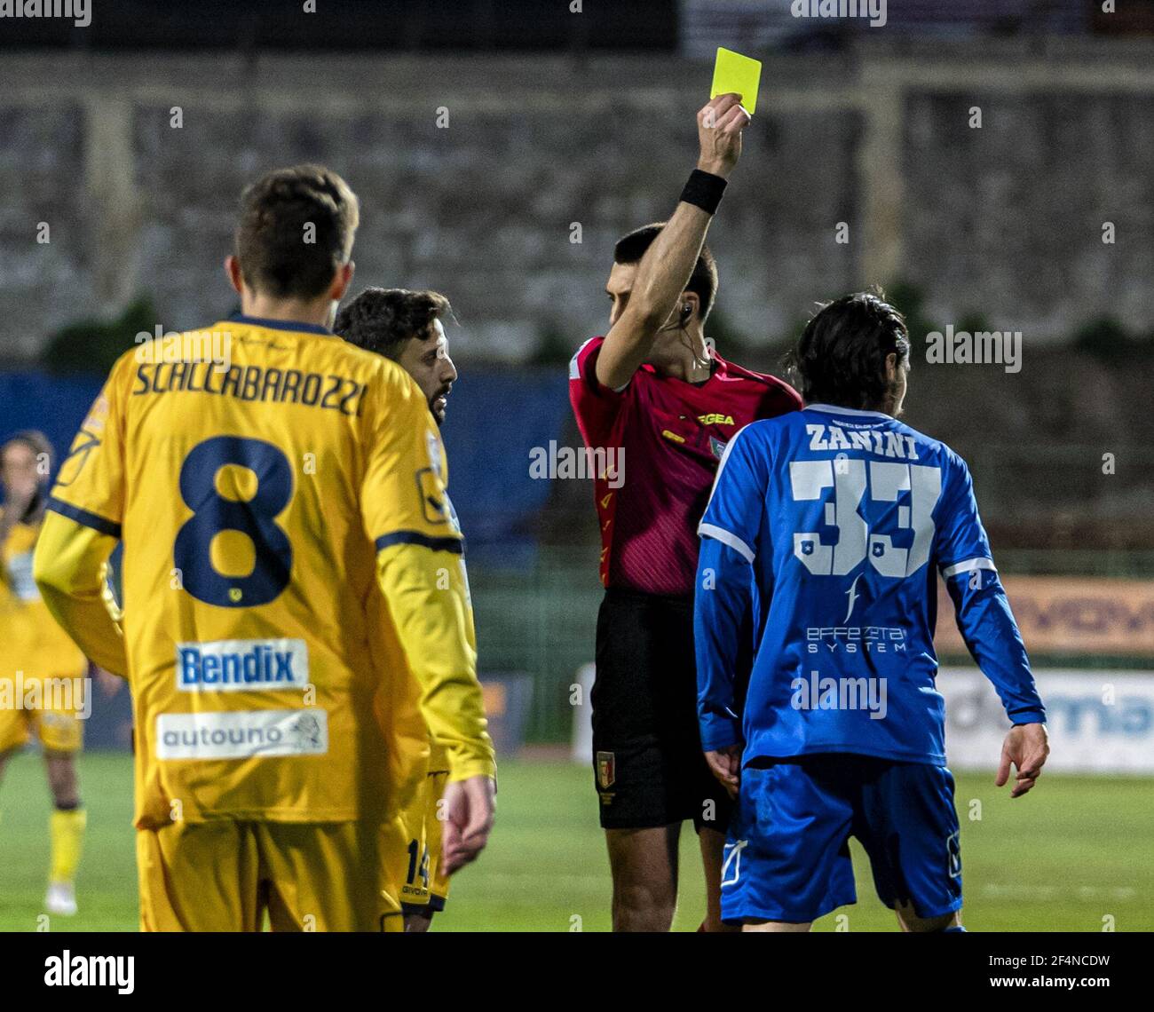 Pagani, Italy. 21st Mar, 2021. The referee extracts the yellow card ...