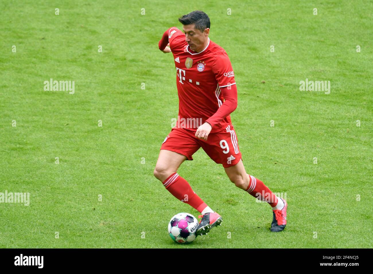 Munich, Deutschland. 20th Mar, 2021. Robert LEWANDOWSKI (FC Bayern ...
