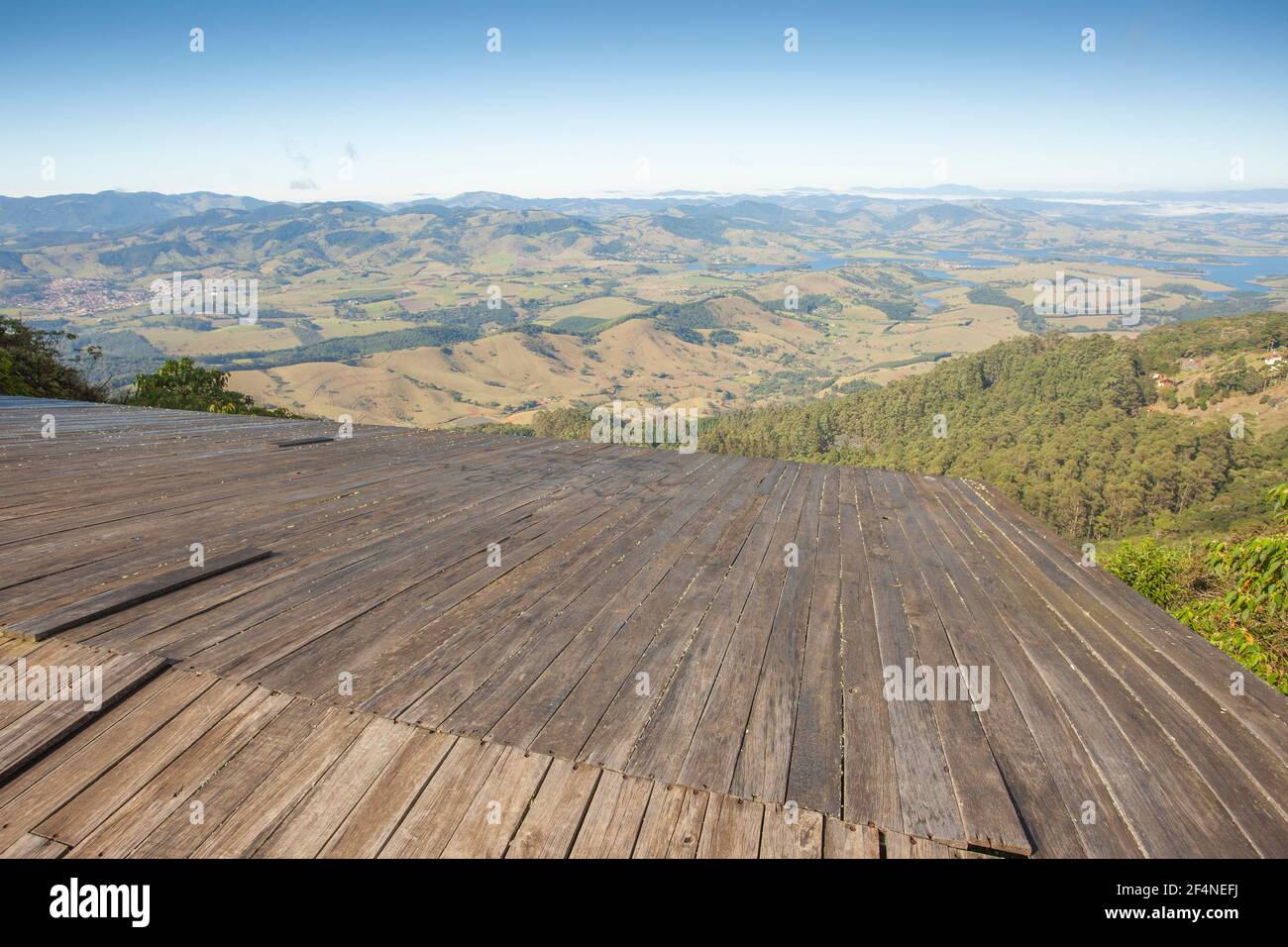 Gliding ramp over a green valley with blue skies background in Brazil ...