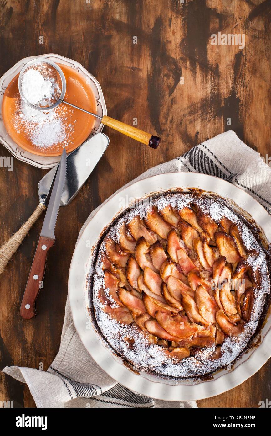 Homemade delicious apple pie, top view, wooden backdrop Stock Photo - Alamy