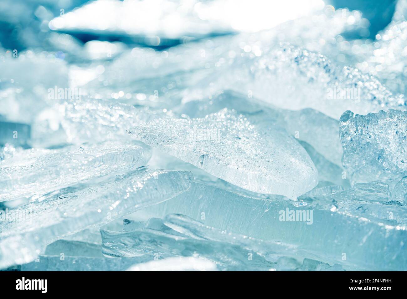 Closeup shot of a transparent shining clear ice sparkling on a frozen ...