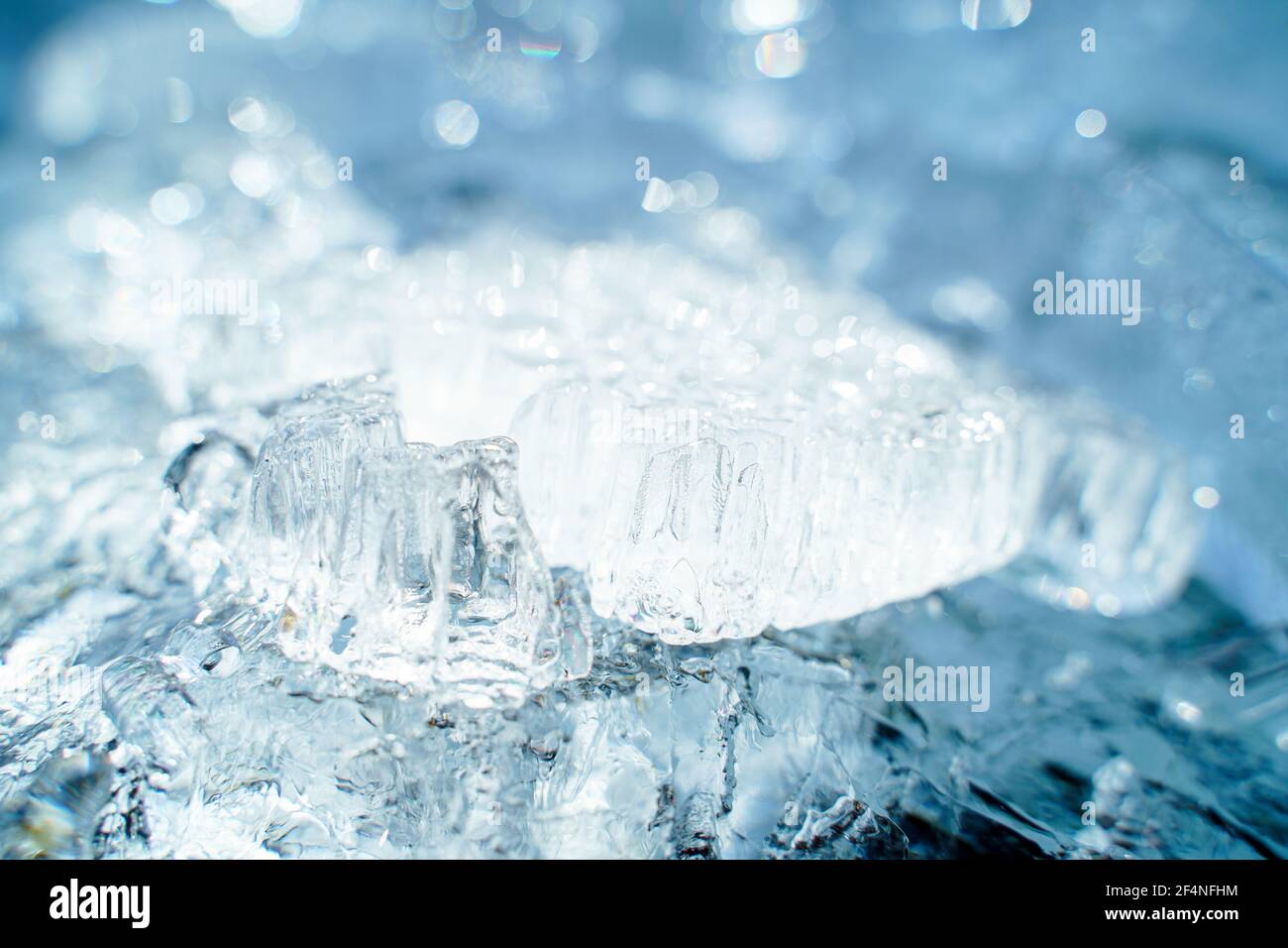 Closeup shot of a transparent shining clear ice sparkling on a frozen ...