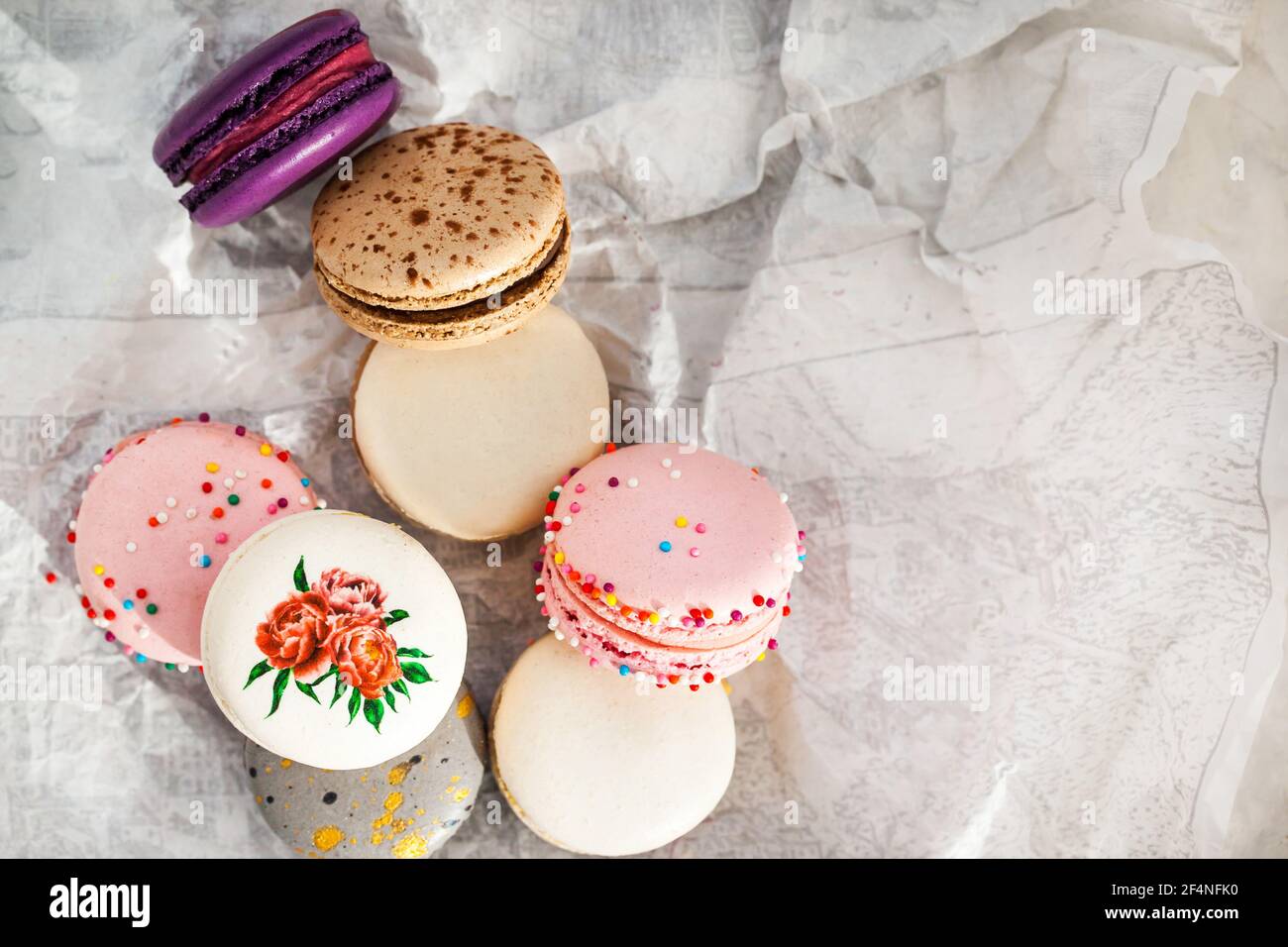 Colorful french macarons on gray background. Pastel colors. Top view ...