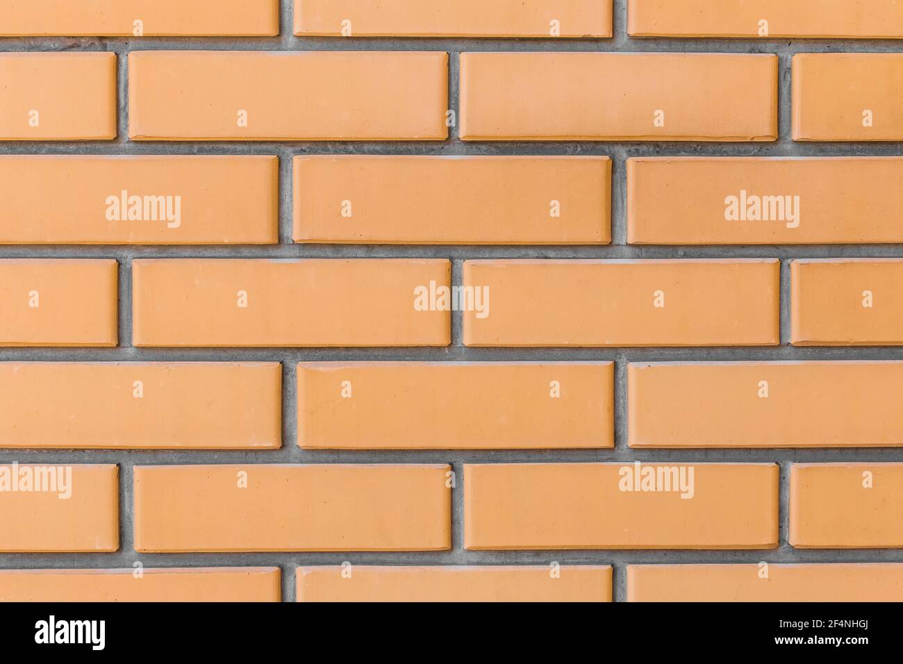 Light orange brick blocks wall texture background Stock Photo - Alamy