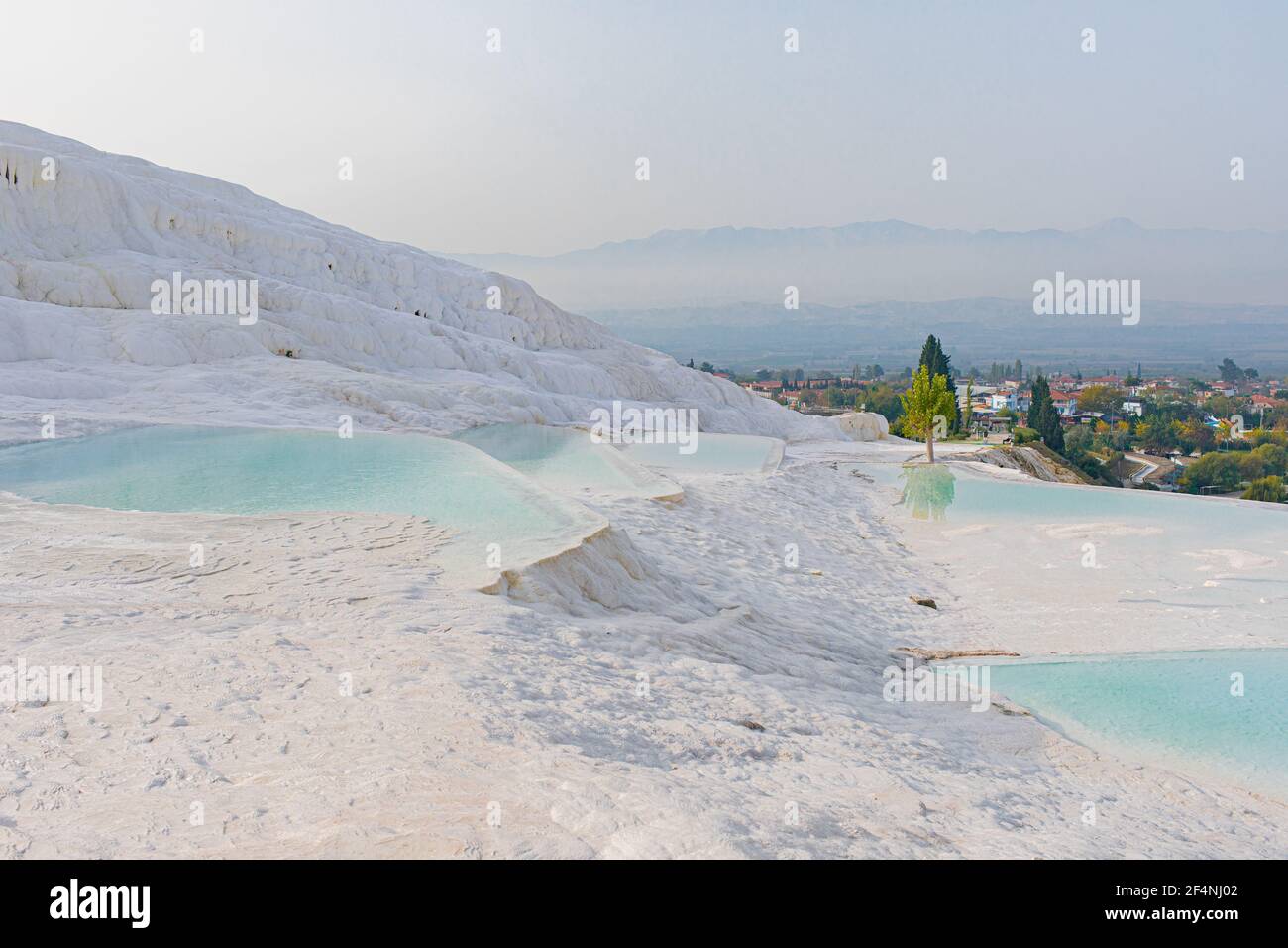 Blue surface of water in step thermal bath travertine terrace of ...