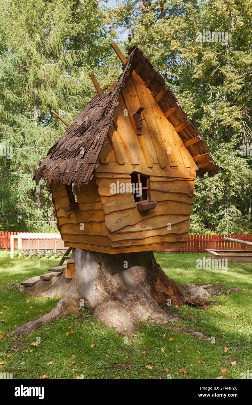 Children playground wooden hut, sunny summer day Stock Photo - Alamy