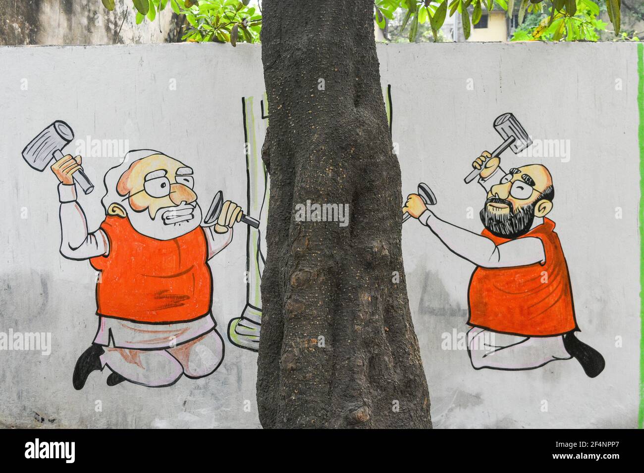 A satirical wall art of PM Narendra Modi and Amit Shah at a street in ...
