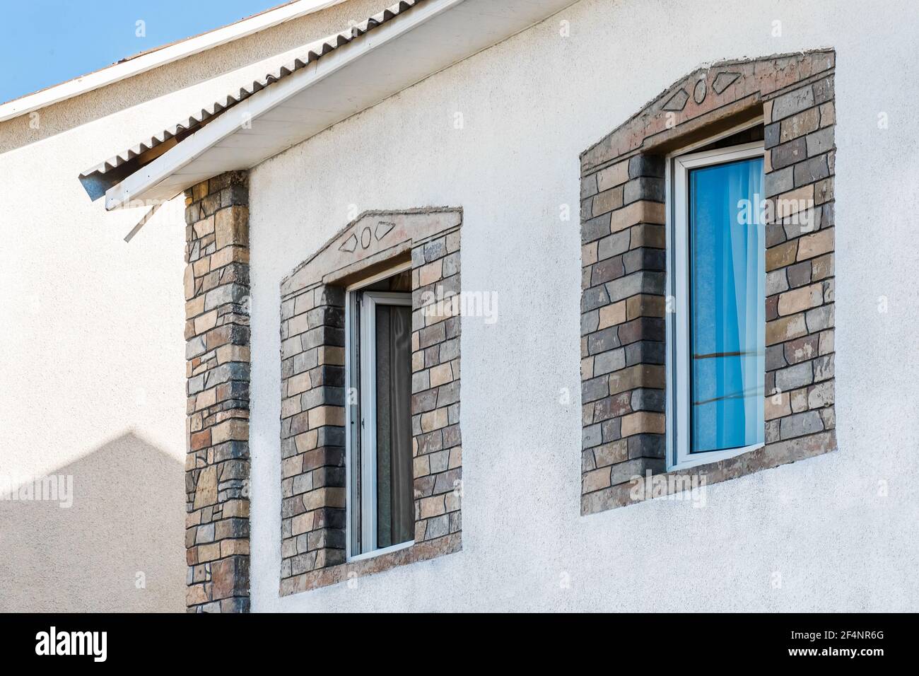 Part of the modern interior of the facade of the house with white ...