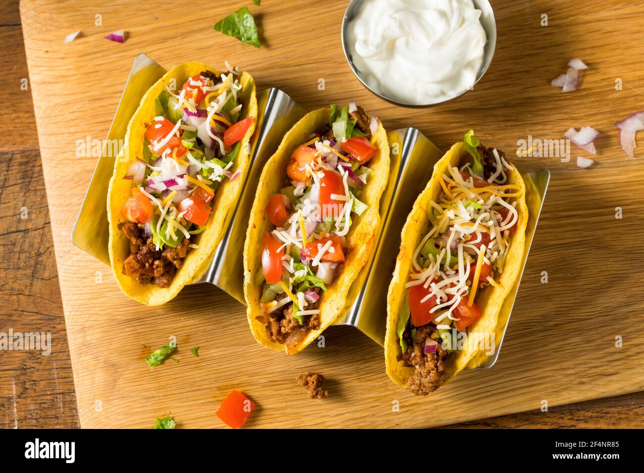 Homemade Ground Beef Hard Shell Tacos with Lettuce and Tomato Stock ...