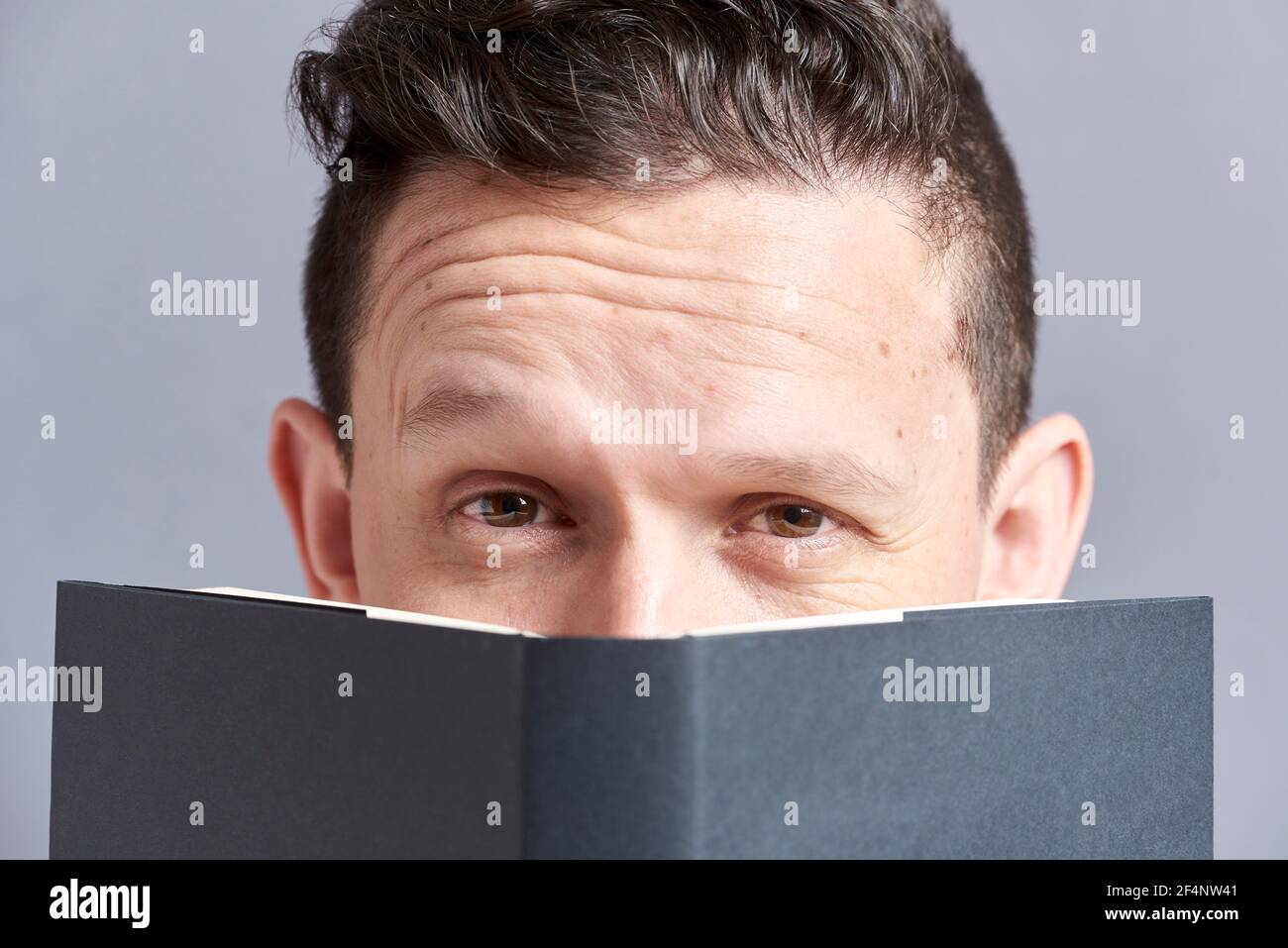Man face raise eyebrow hi-res stock photography and images - Alamy