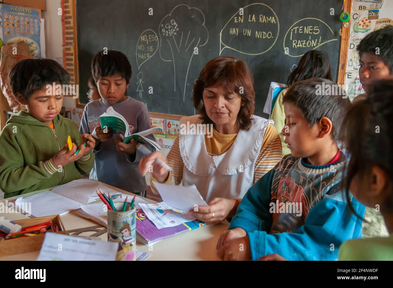 Chaco Province. Argentine. 15-01-2019. Indigenous teacher helping ...