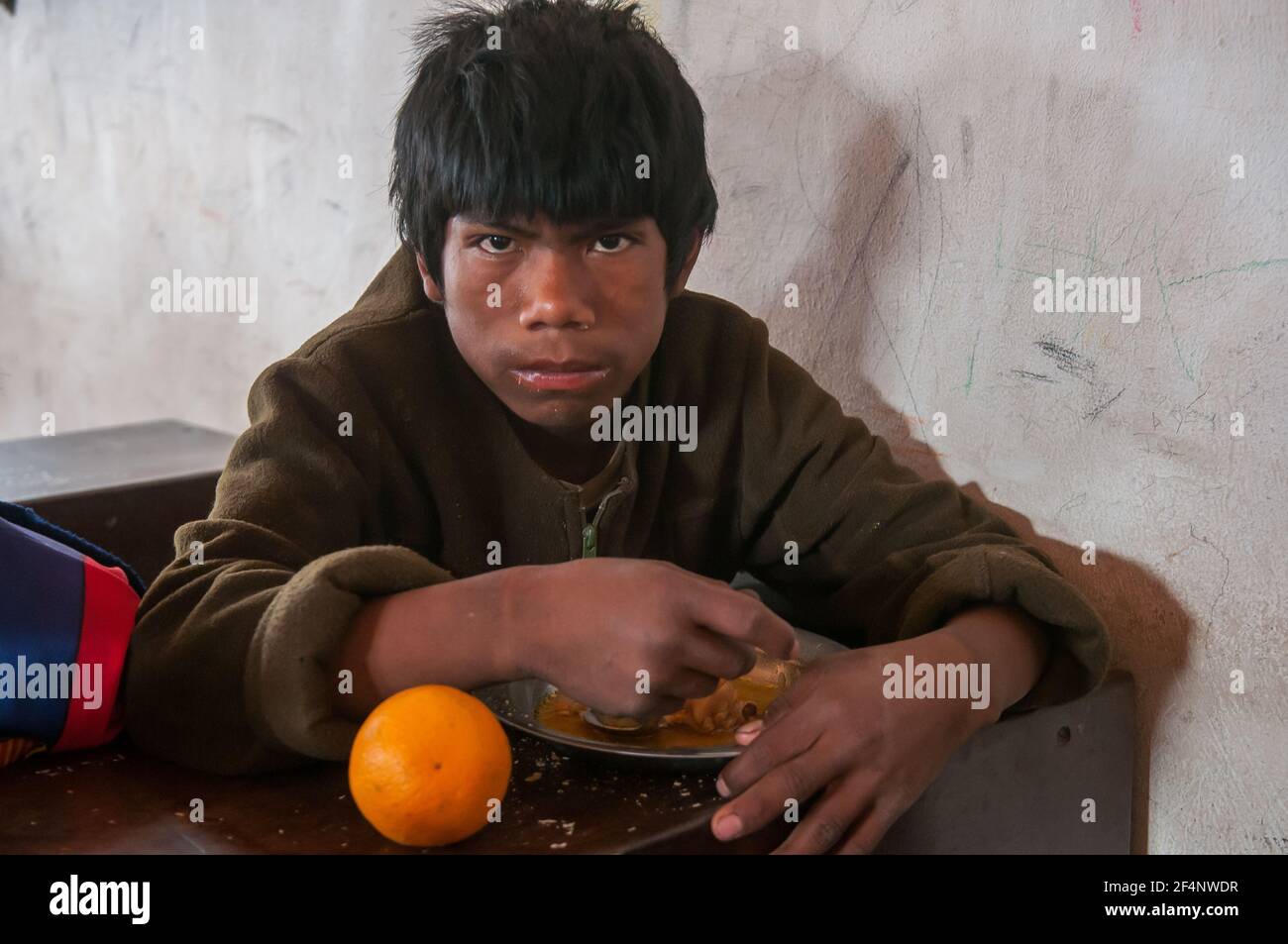 Portrait of poor indigenous boy hi-res stock photography and images - Alamy
