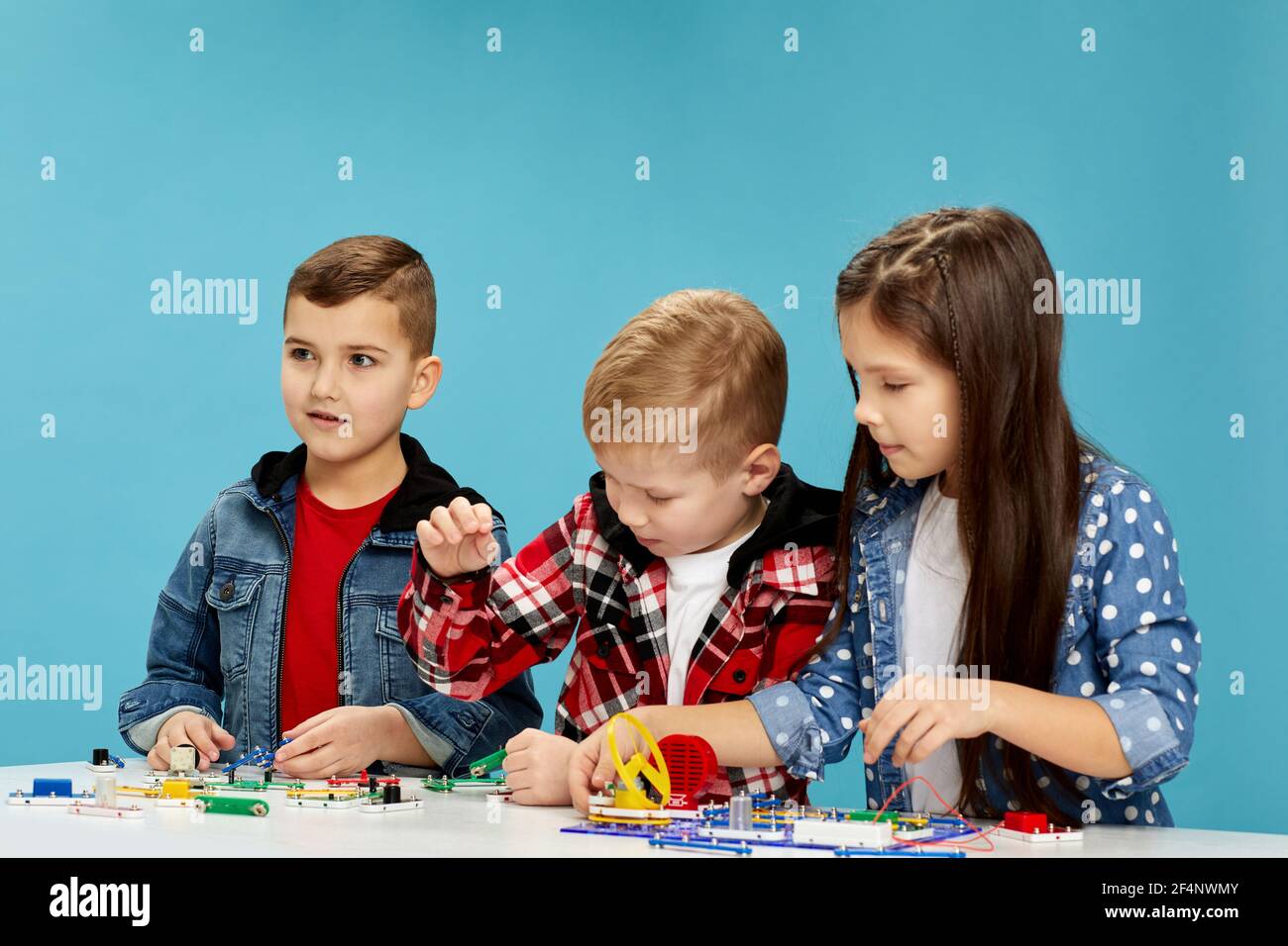 children playing with electronic constructor at studio Stock Photo - Alamy