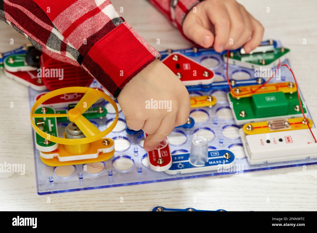 children playing with electronic constructor at studio Stock Photo - Alamy