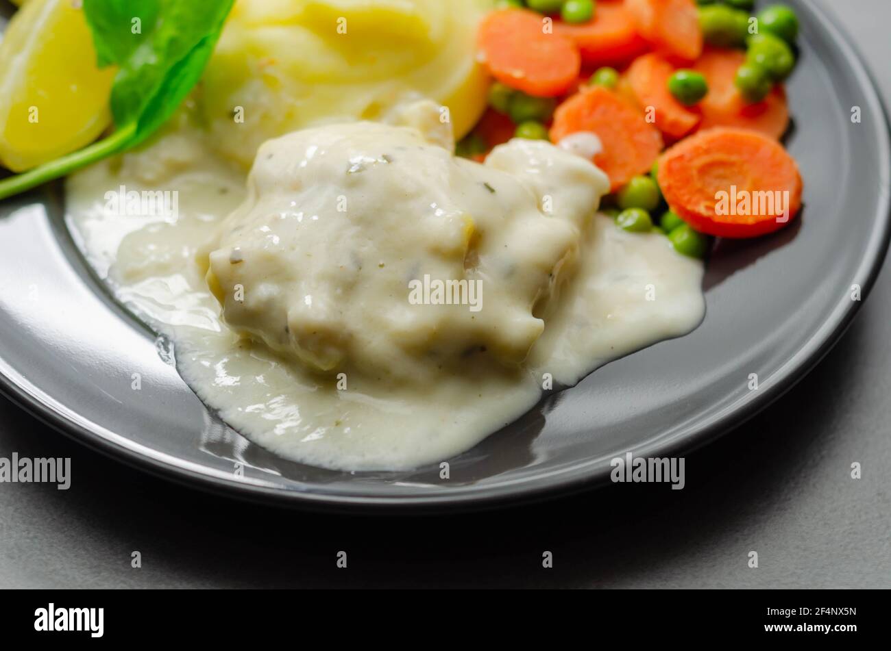 Cod Mornay, flaky cod with a creamy cheese sauce, with mashed potato ...