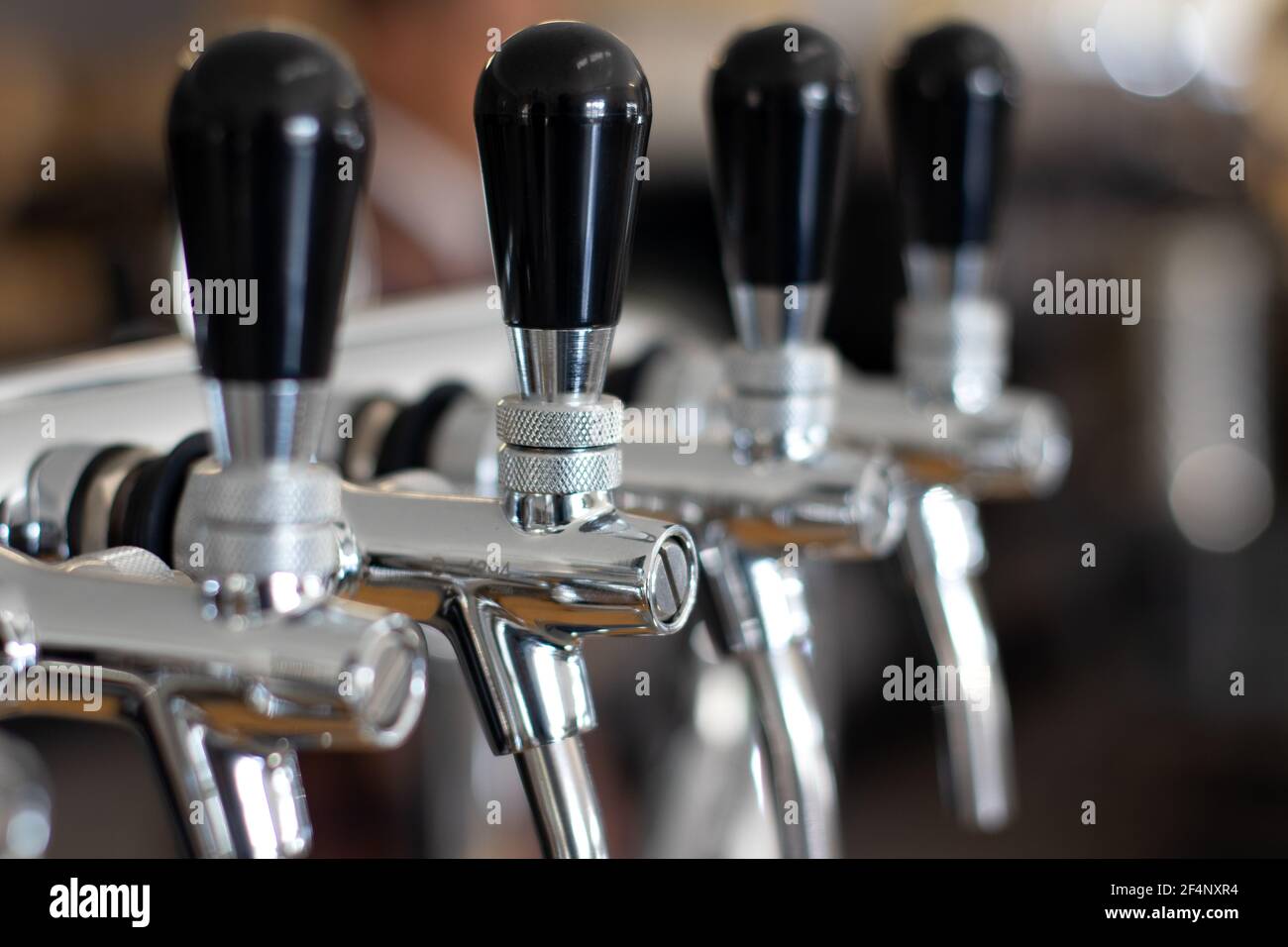 Silver beer taps hi-res stock photography and images - Alamy
