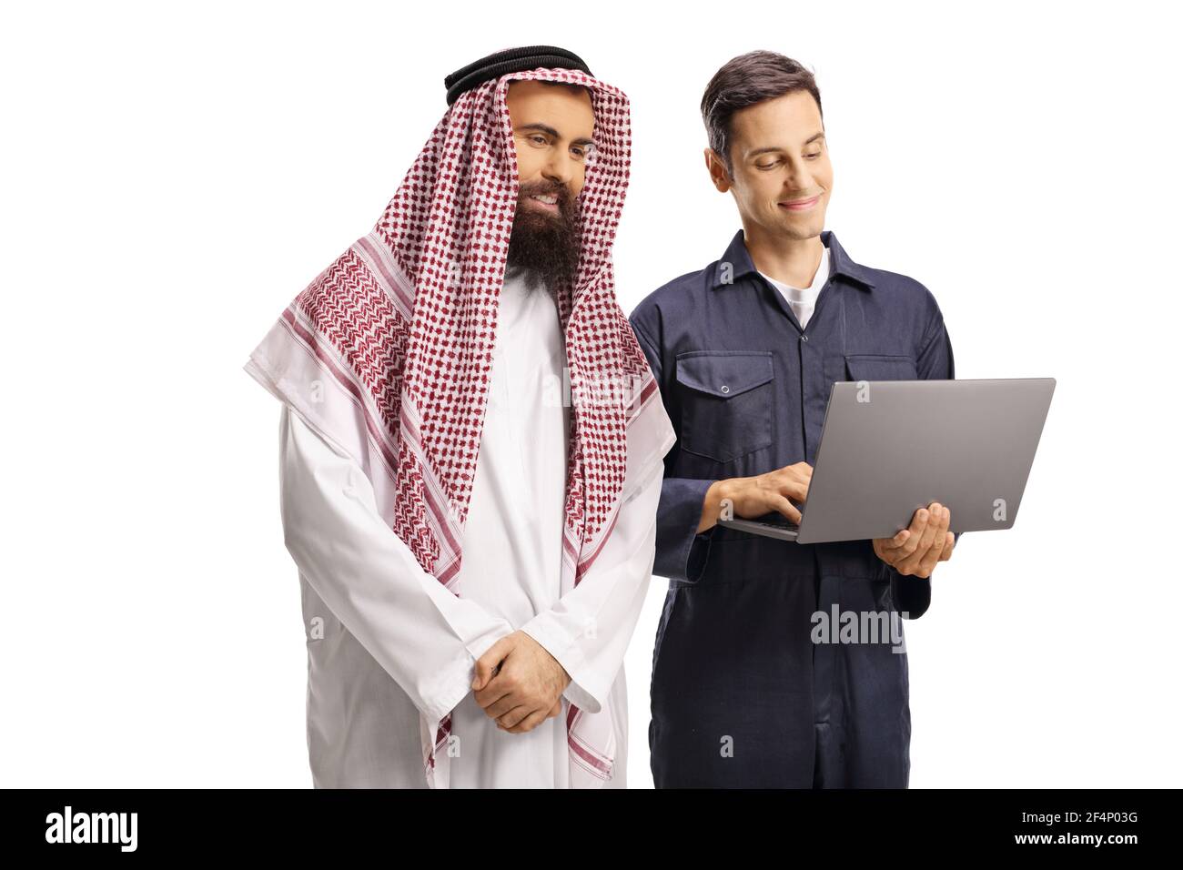 Auto mechanic showing a laptop computer to a saudi arab man isolated on ...